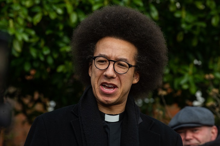 Far right "priest" gives "Elon salute" aka Nazi salute at pro-life ...